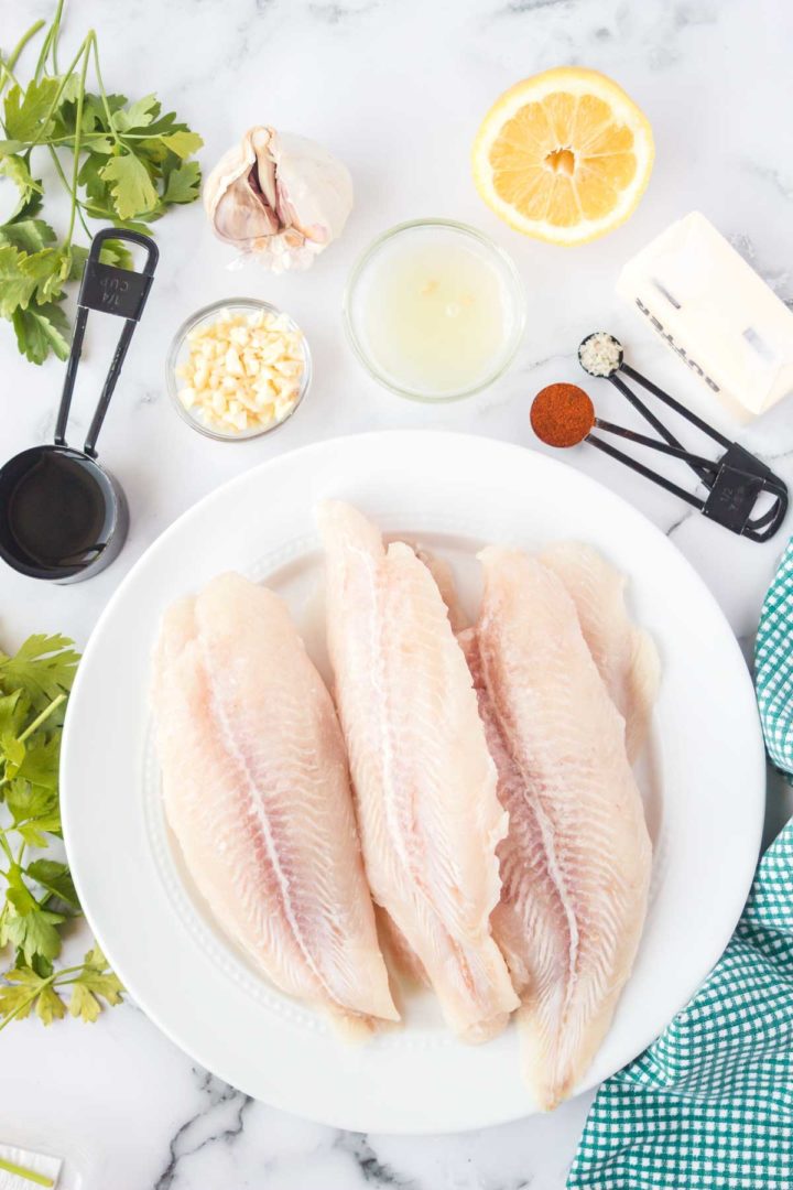 Baked Swai with White Wine Lemon Garlic Sauce | Babaganosh